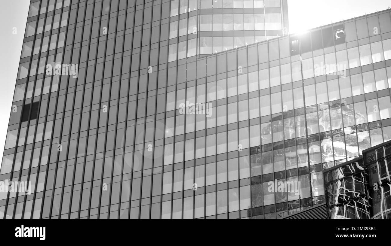 Commercial building close up in blue tone. Gigantic skyscraper from ...