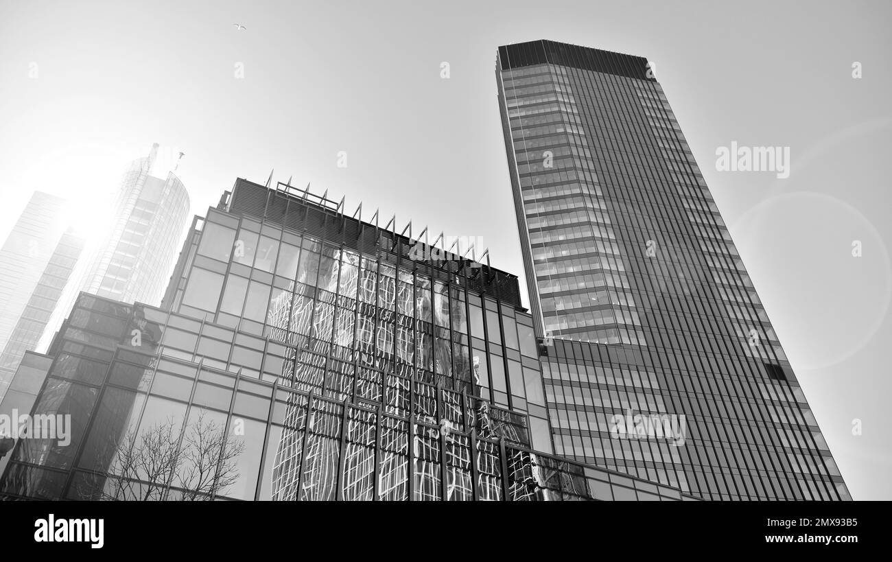 Commercial building close up in blue tone. Gigantic skyscraper from ...