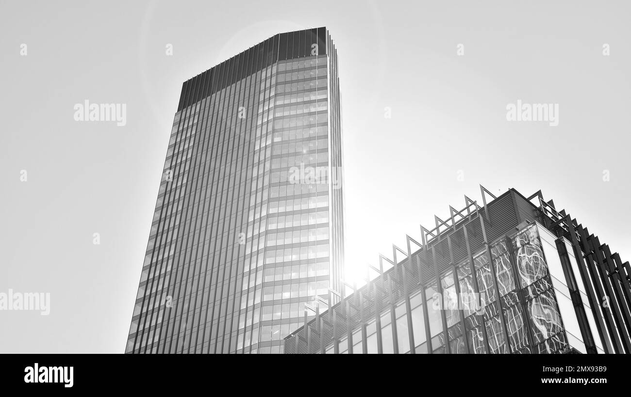 Commercial building close up in blue tone. Gigantic skyscraper from ...