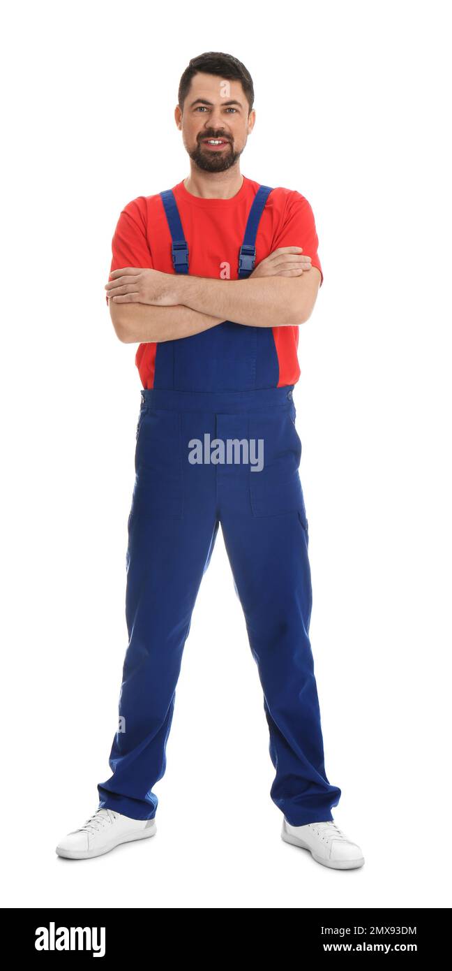 Full length portrait of professional auto mechanic on white background ...