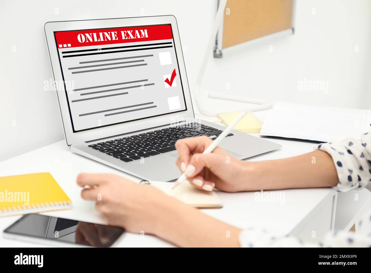 Student passing online exam at home, closeup Stock Photo - Alamy