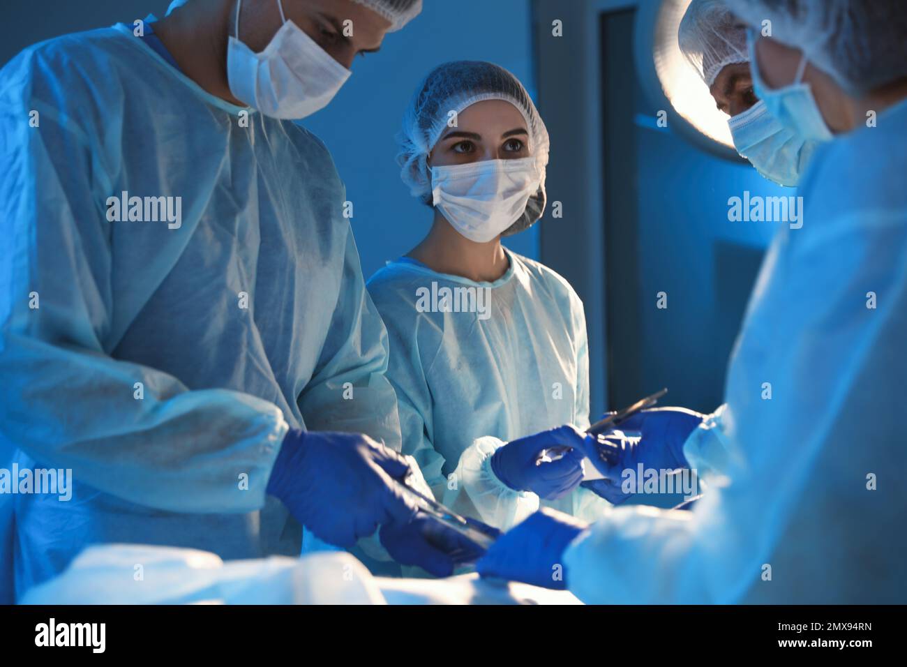 Plastic surgeons performing surgery hi-res stock photography and images ...