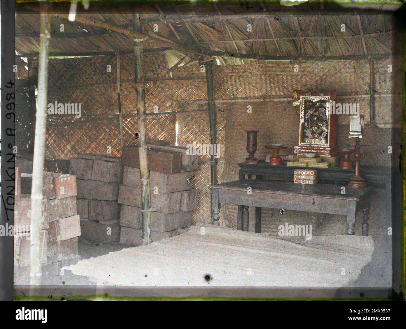 Tonkin, Indochina the interior of the hut temporarily housing bones ...