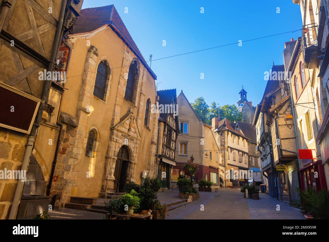 Vintage houses along street of Monlucon Stock Photo - Alamy