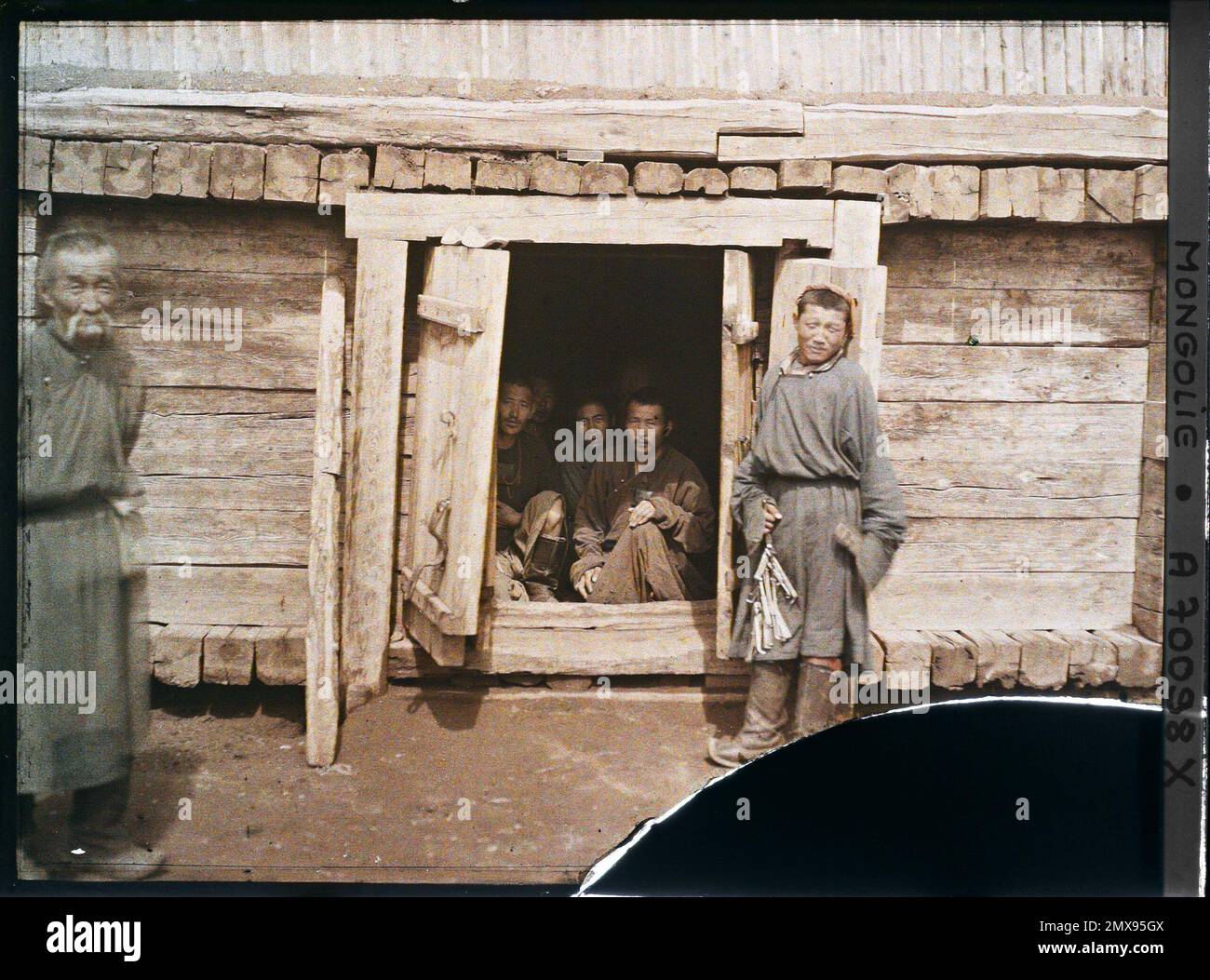Ourga, Mongolia Guardians near an open cell, in the prison courtyard ...