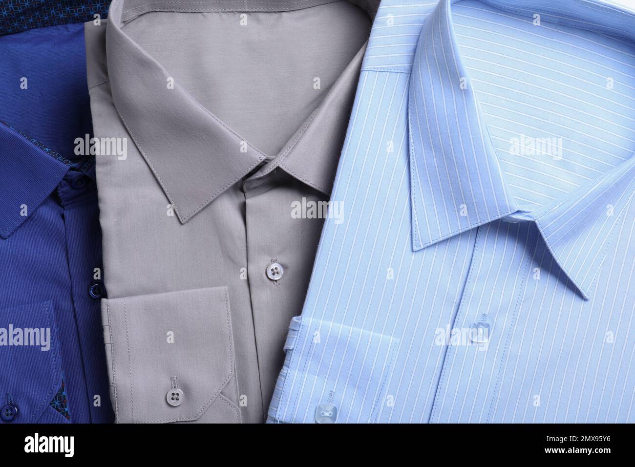 Stylish shirts as background, top view. Dry-cleaning service Stock ...