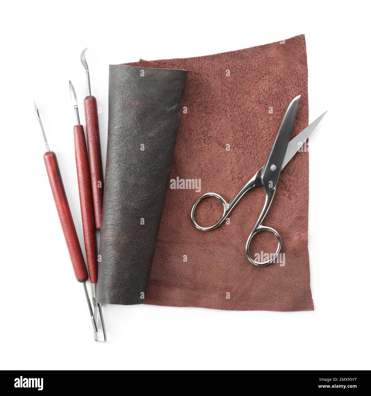 Leather sample and craftsman tools isolated on white, top view Stock ...