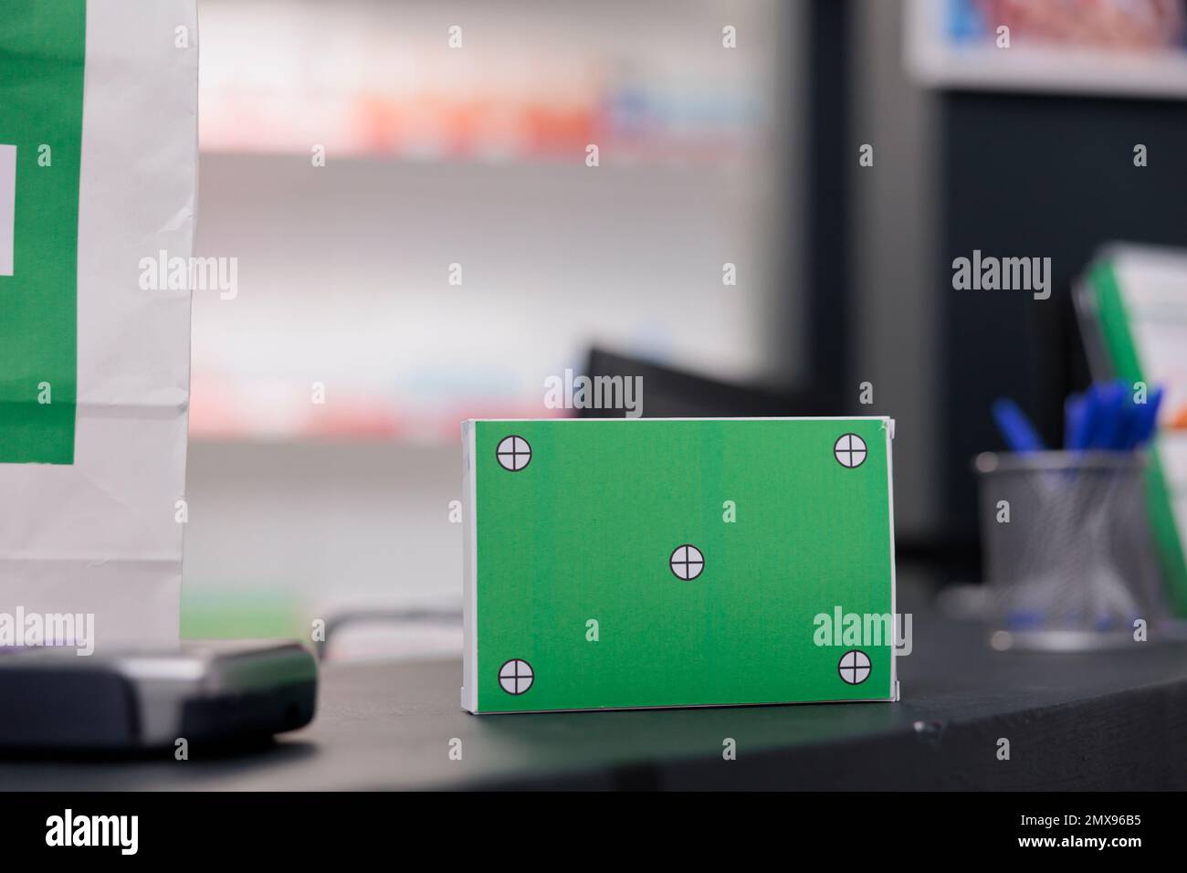 Green screen mock up chroma key drugs packages standing on registration ...