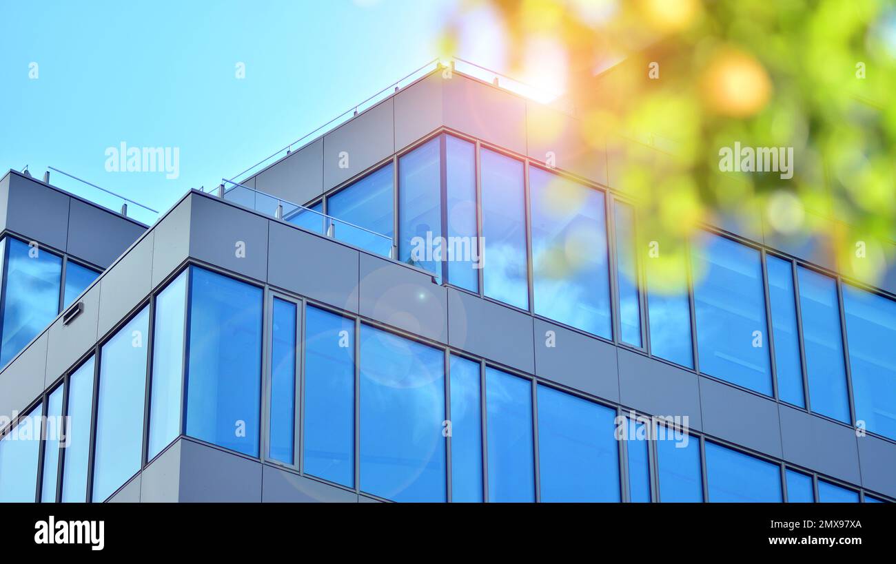 Inspiring view of the modern city. The wall of the building of glass ...