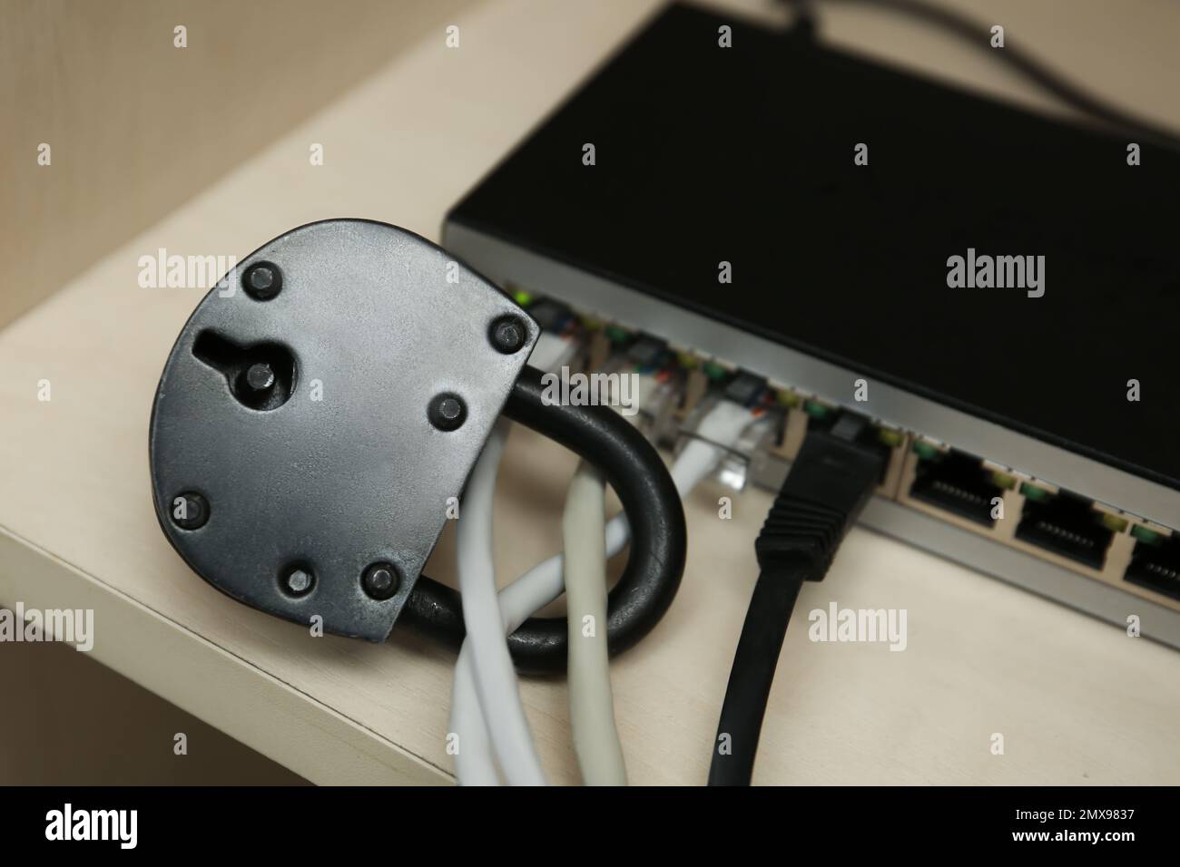 Wi-Fi router with padlock on shelf. Protection from cyber attack Stock ...