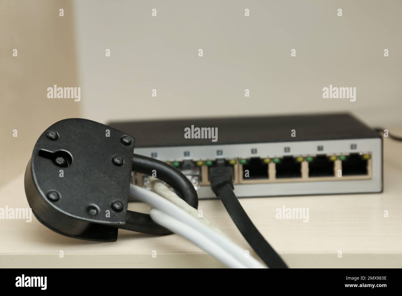 Wi-Fi router with padlock on shelf. Protection from cyber attack Stock ...