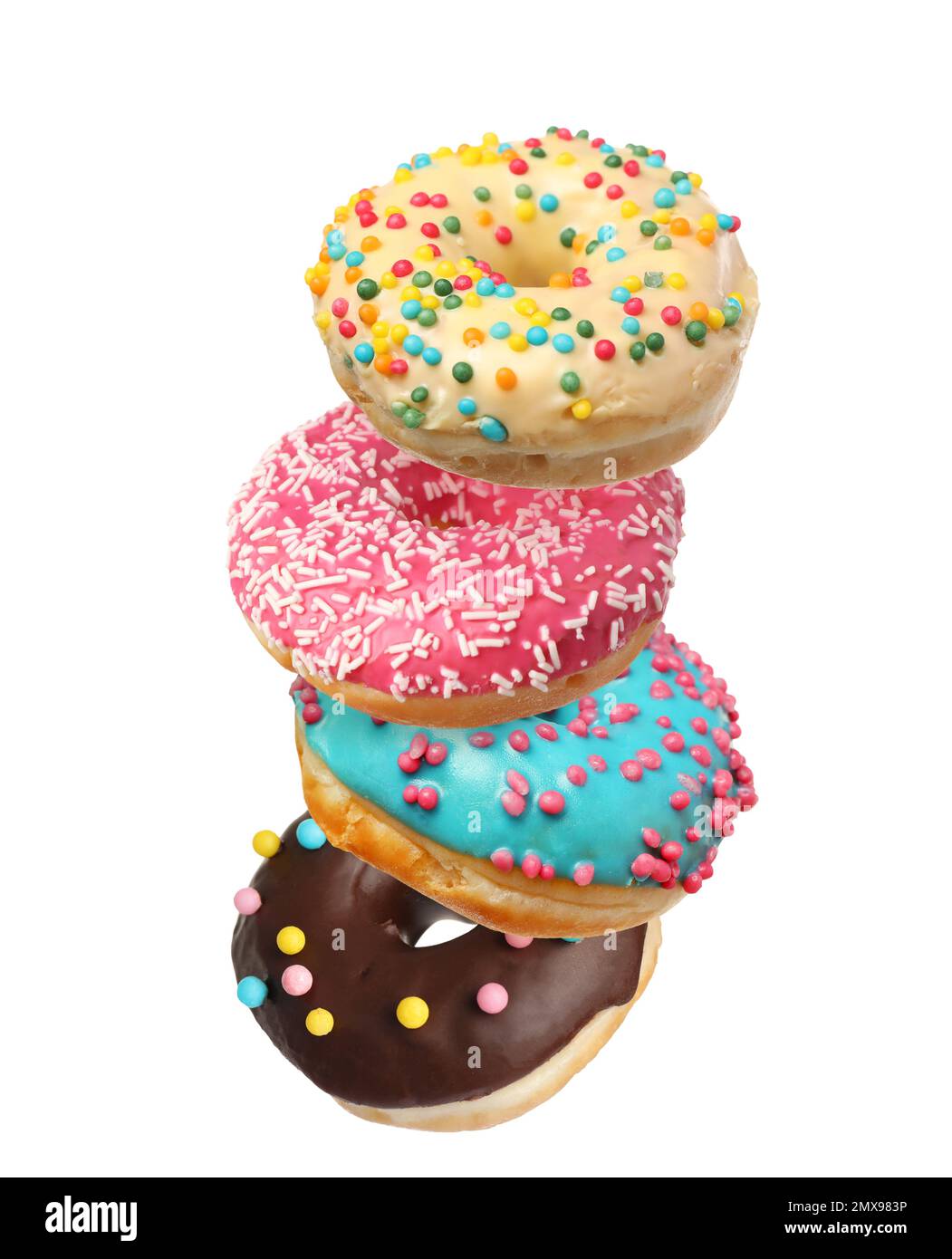Set of falling delicious donuts on white background Stock Photo - Alamy