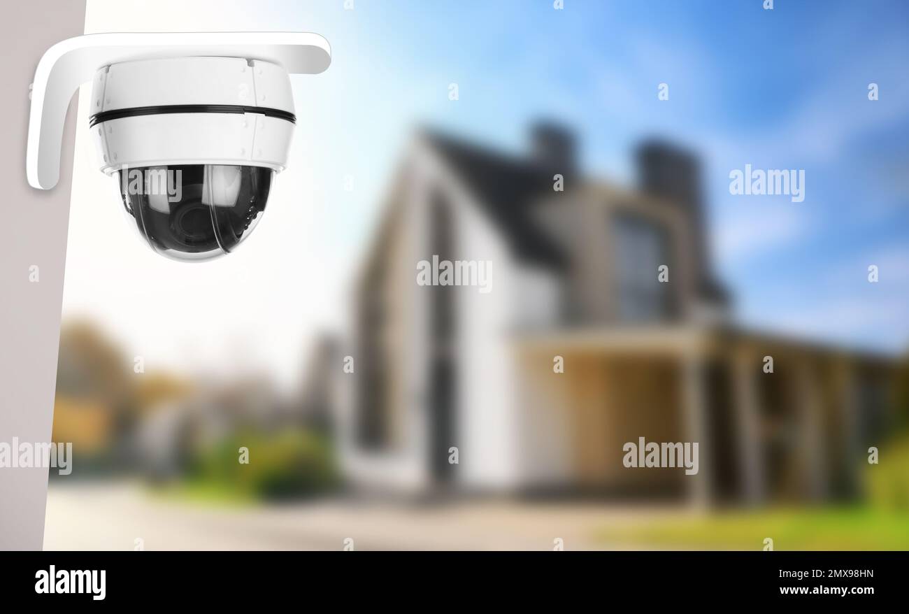 Home security system. House under CCTV camera surveillance Stock Photo ...