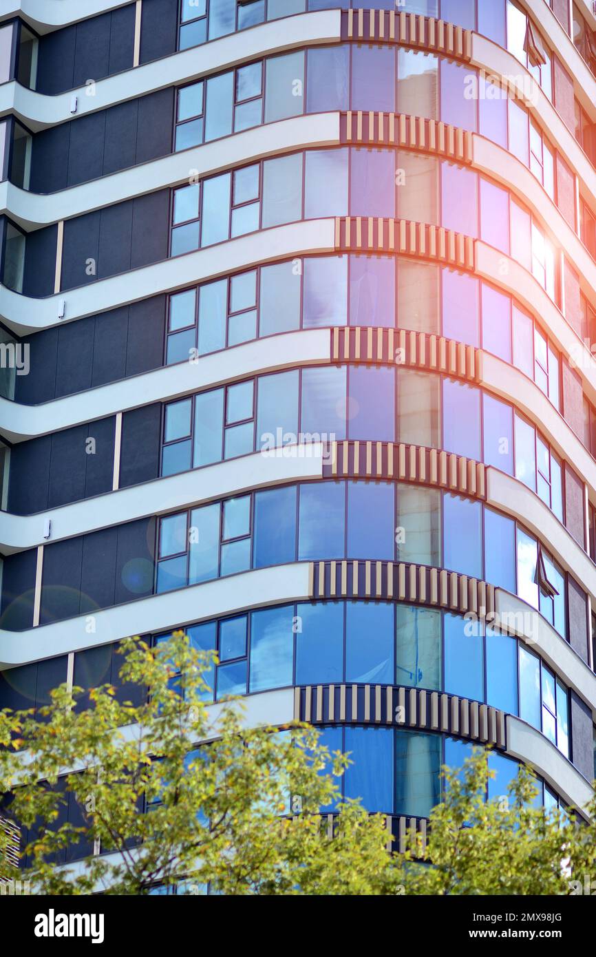 Exterior of a high modern multi-story apartment building - facade ...
