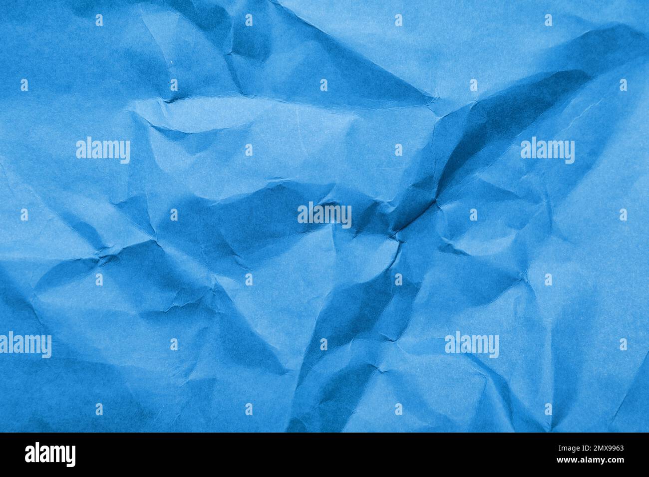 Crumpled blue paper as background Stock Photo - Alamy