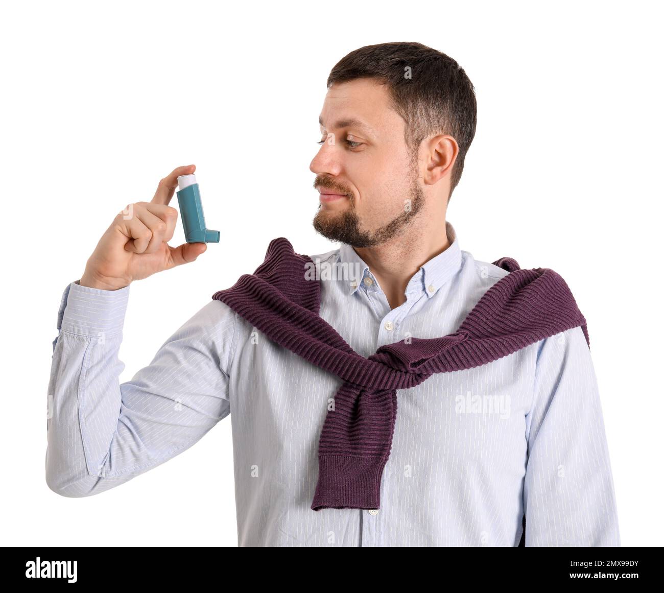 Man with inhaler isolated on white Stock Photo - Alamy