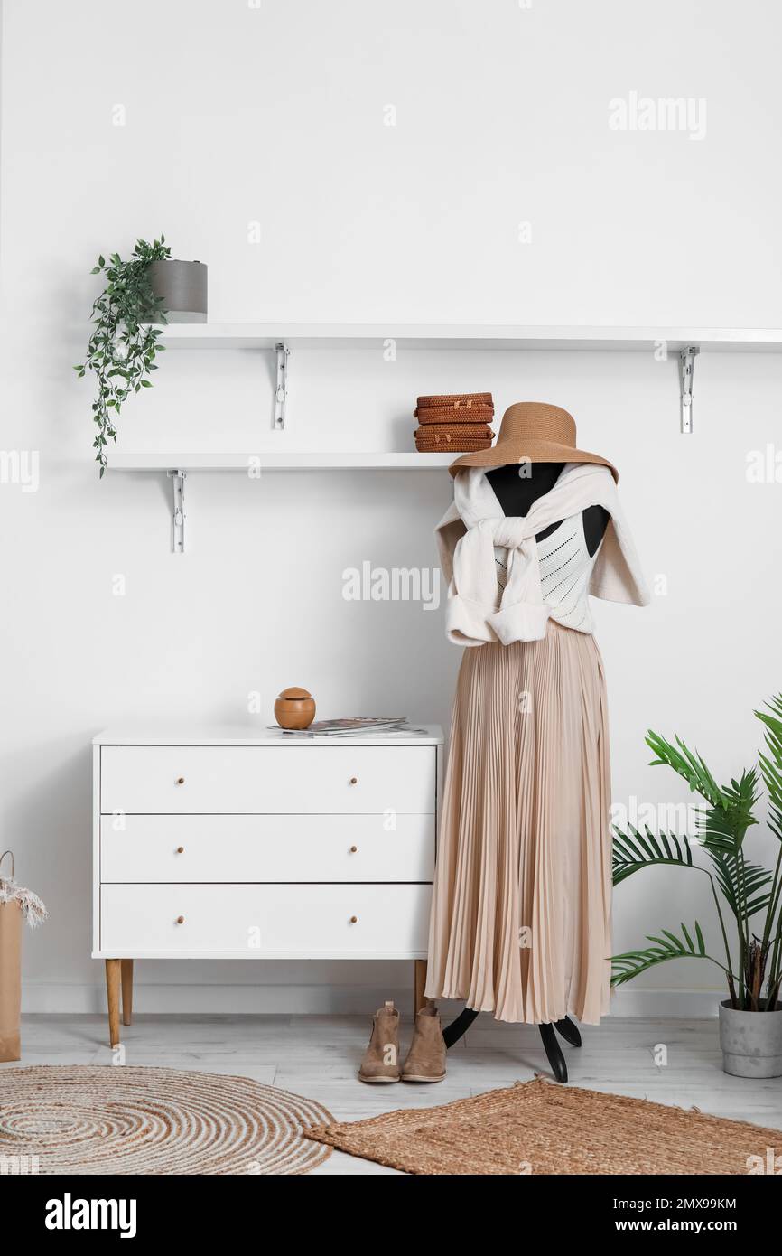 Interior of fashion designer's studio with mannequin and clothes Stock ...