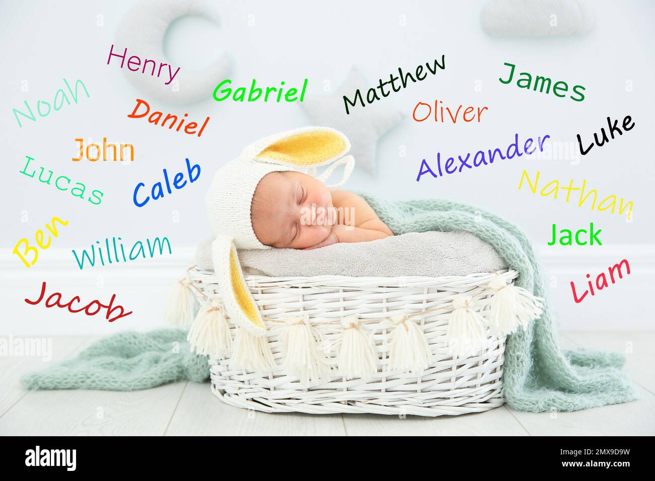 Choosing name for baby boy. Adorable newborn sleeping Stock Photo - Alamy