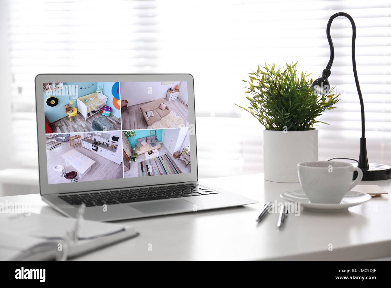 Laptop with view from CCTV cameras. Home security system Stock Photo ...