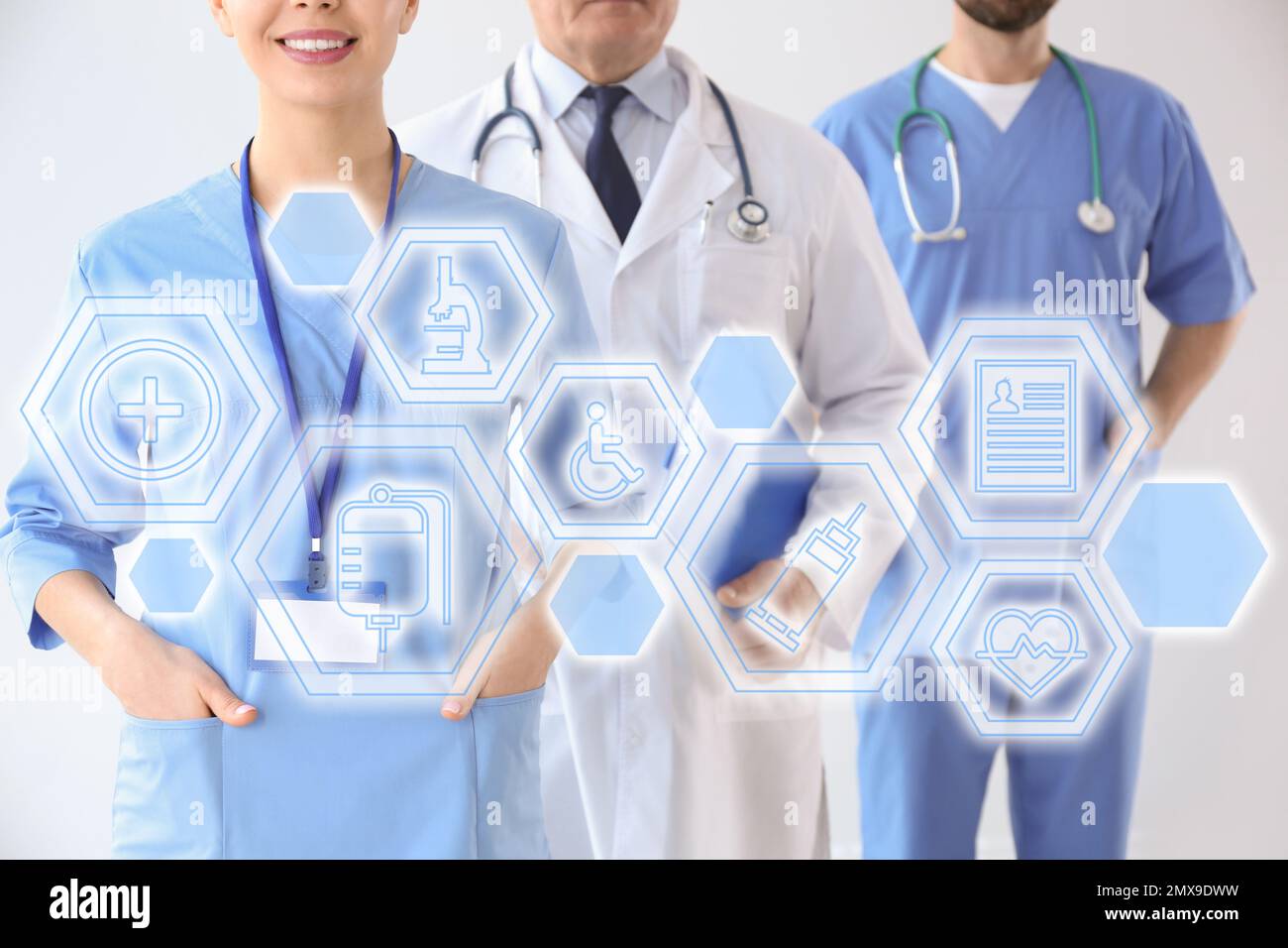 Doctors against light background, closeup. Medical service Stock Photo ...