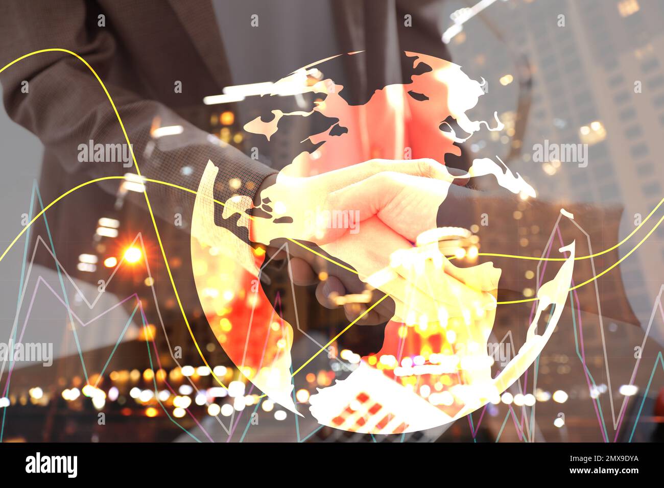 Forex trading. World globe with charts against people shaking hands and ...