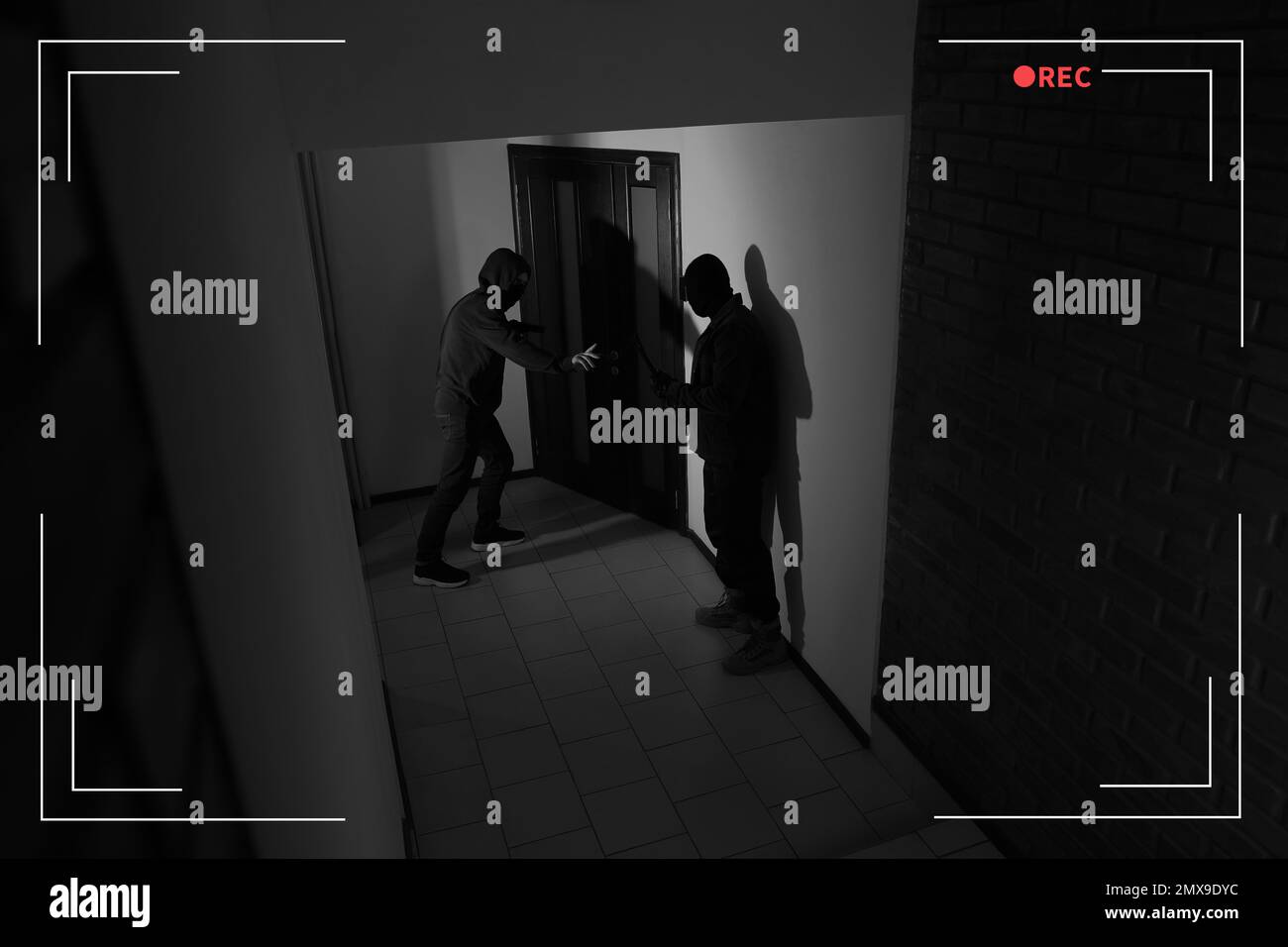 Dangerous criminals with gun and crow bar intruding into apartment ...