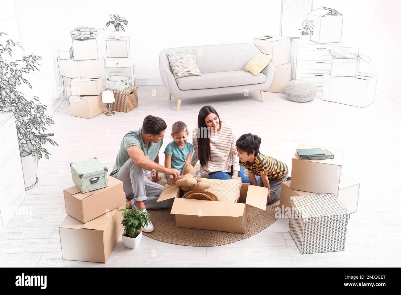 Happy family unpacking moving boxes in their new house Stock Photo - Alamy