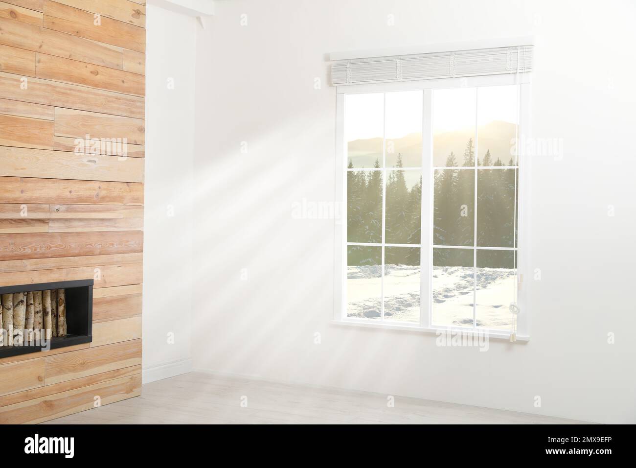 Beautiful view of snowy forest through big window Stock Photo - Alamy