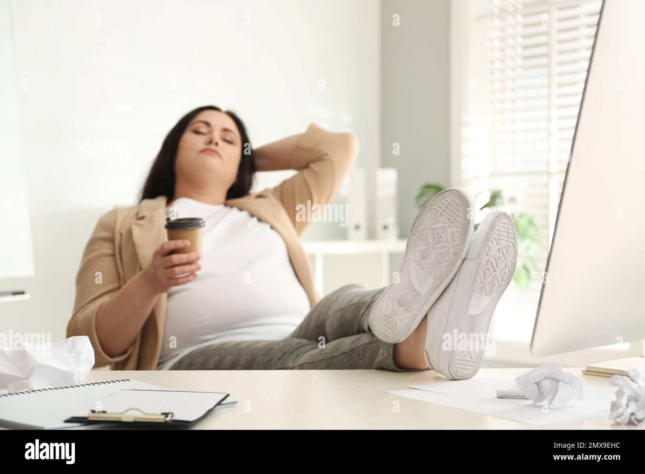 Overweight office worker hi-res stock photography and images - Alamy