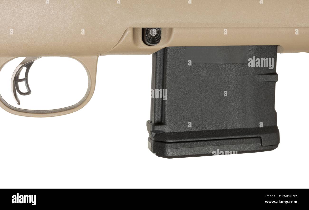 Rifle magazine inserted just in front of the trigger isolated on white ...