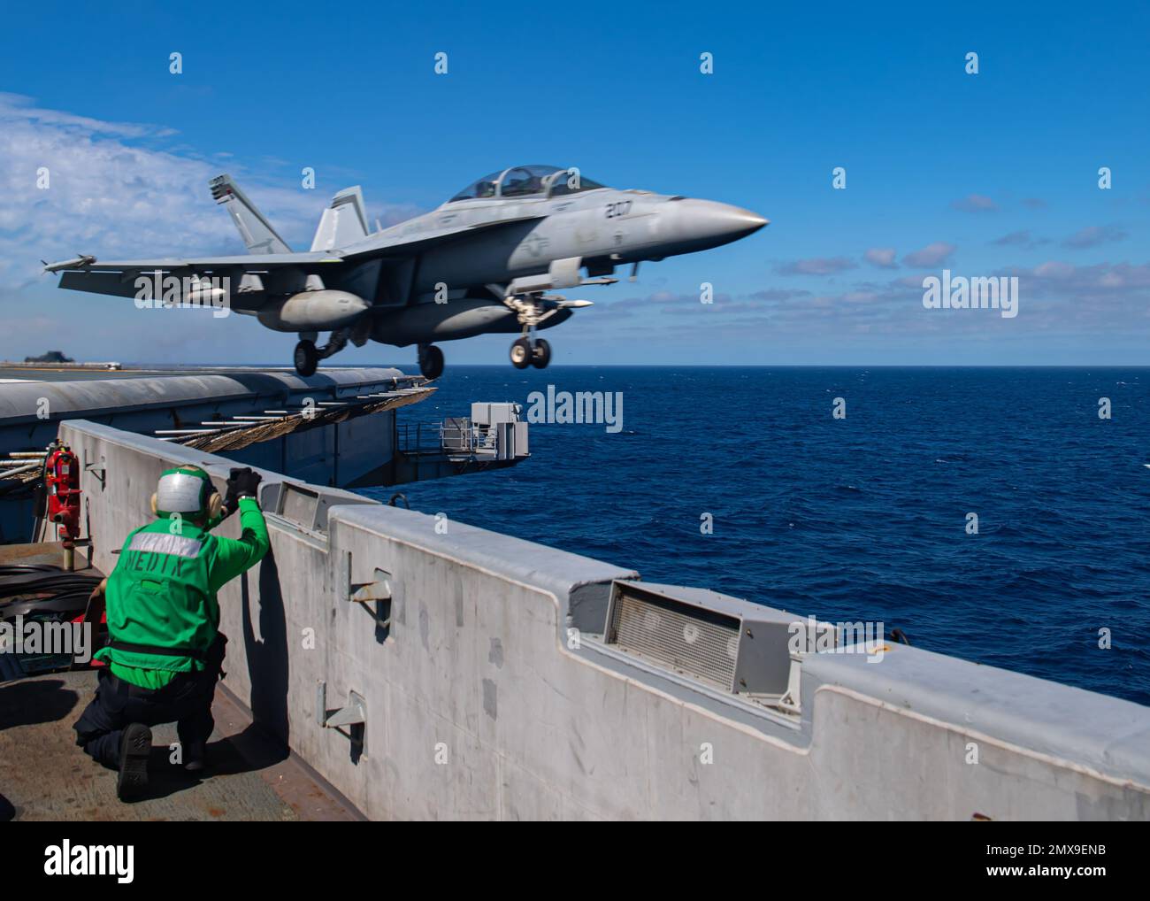 230202-N-MH015-1047 SOUTH CHINA SEA (Feb. 2, 2023) An F/A-18F Super Hornet from the “Mighty ...
