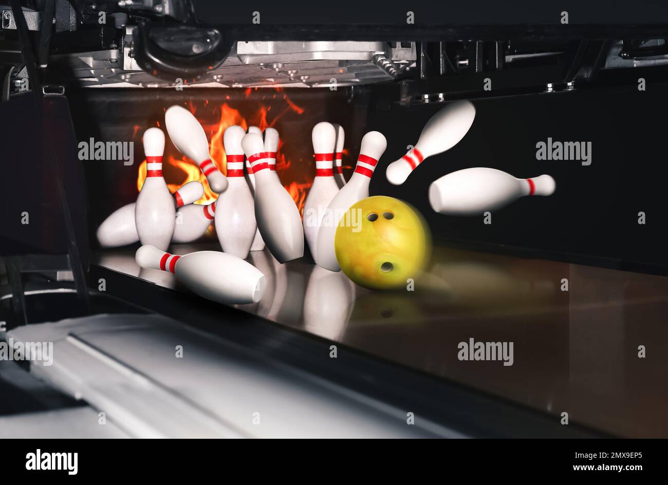 Bowling ball bouncing pins. Successful hit - strike Stock Photo - Alamy
