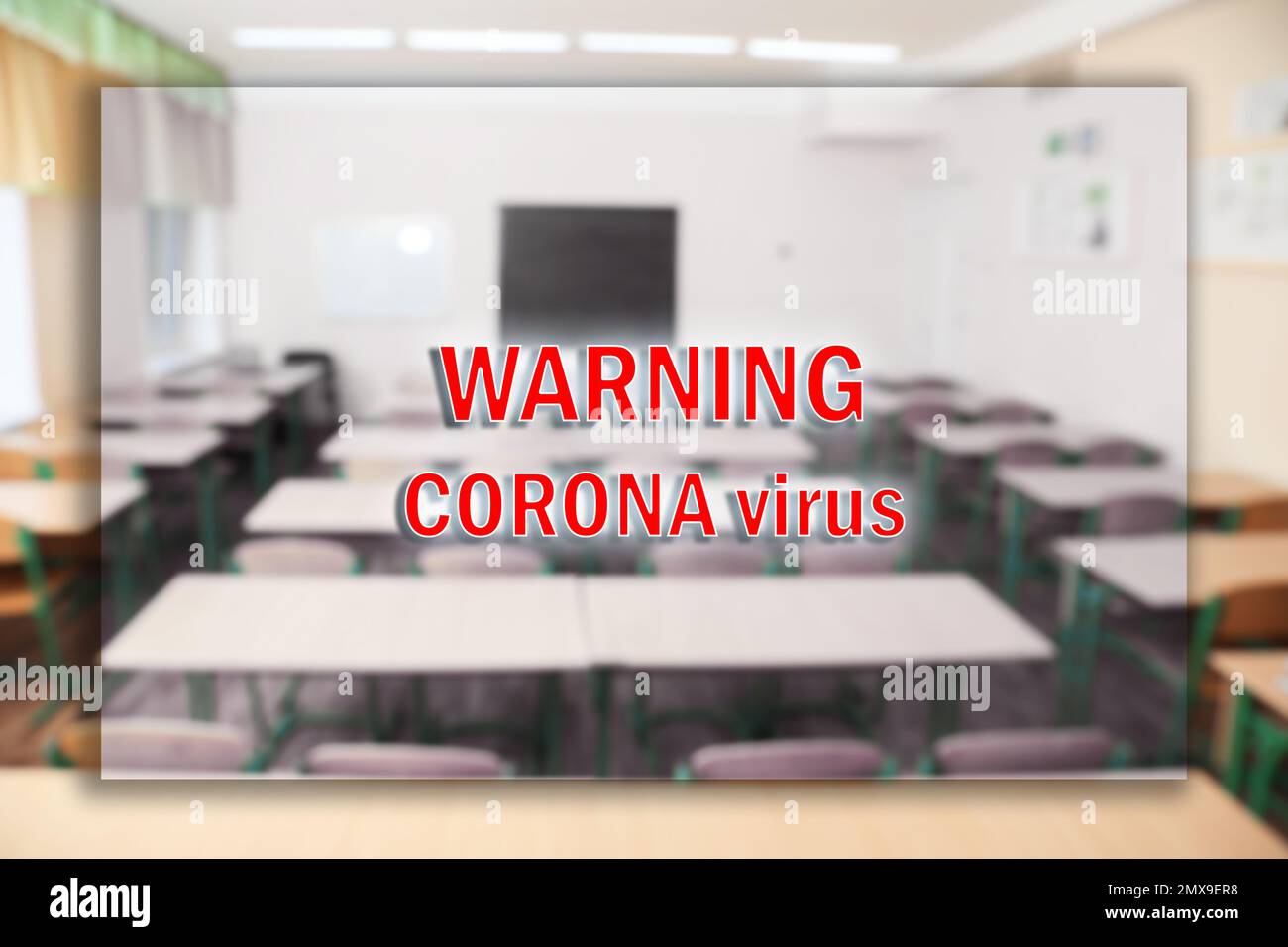 Blurred view of empty classroom and text WARNING CORONA VIRUS. School ...