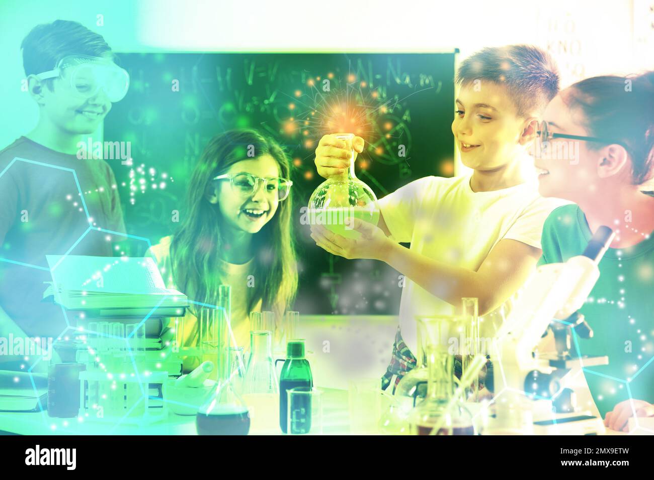 Smart pupils making experiment in chemistry class Stock Photo - Alamy