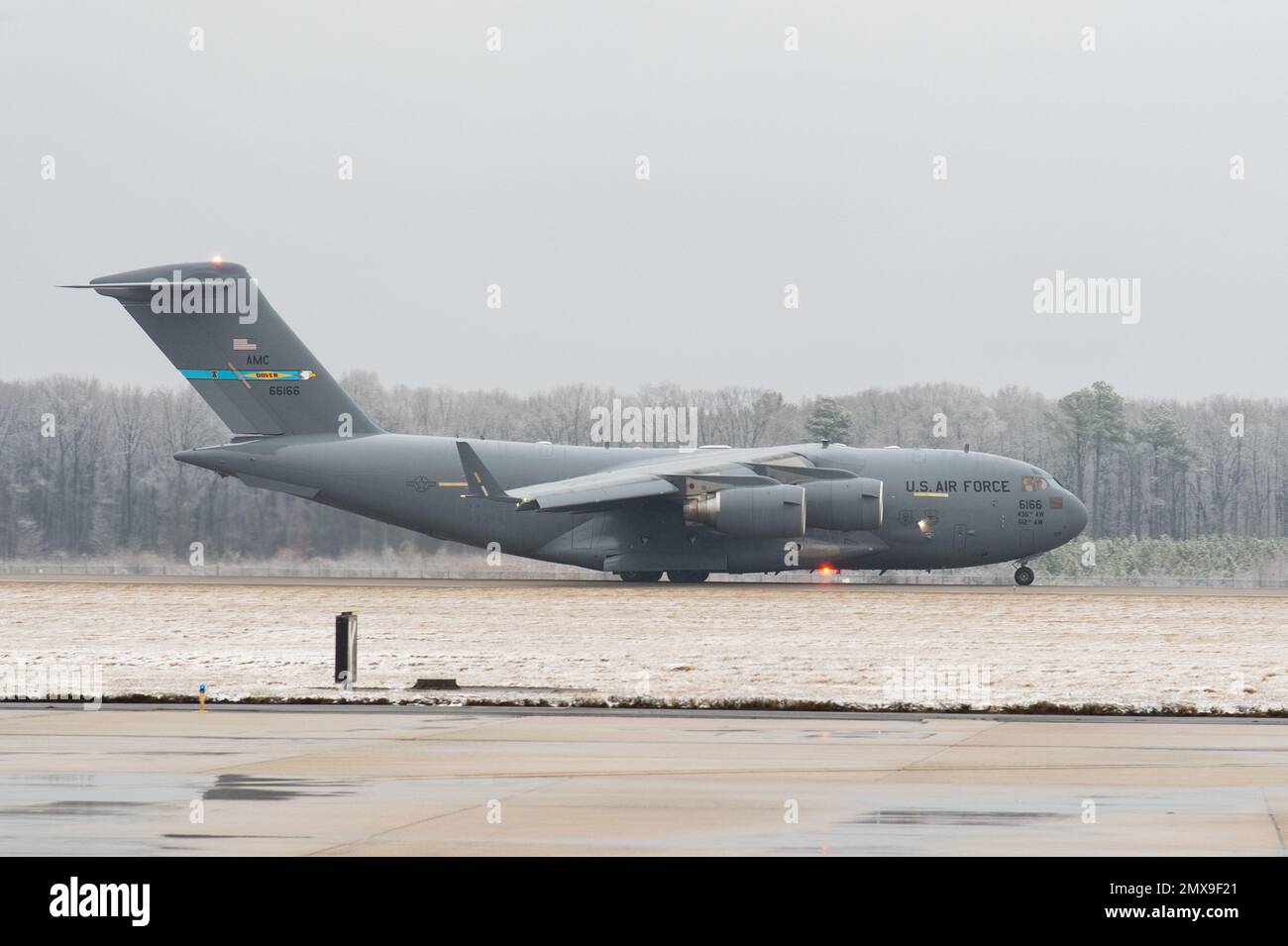 A C-17 Globemaster III takes off at Dover Air Force Base, Delaware, Feb ...