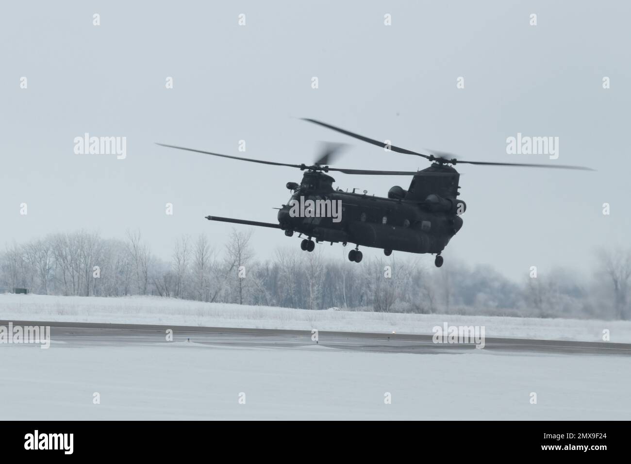 A U.S. Army MH-47G Chinook helicopter lands at Grand Forks Air Force ...