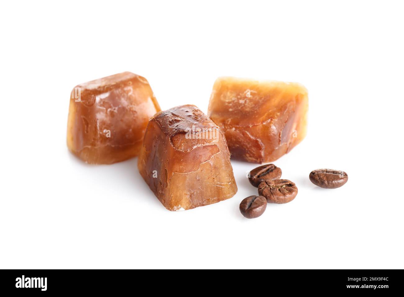 Coffee ice cubes and beans on white background Stock Photo - Alamy