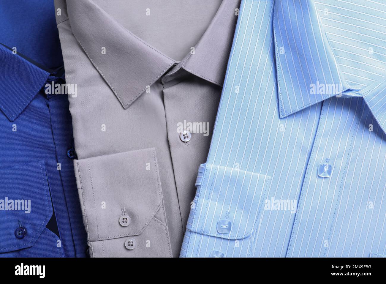 Stylish shirts as background, top view. Dry-cleaning service Stock ...