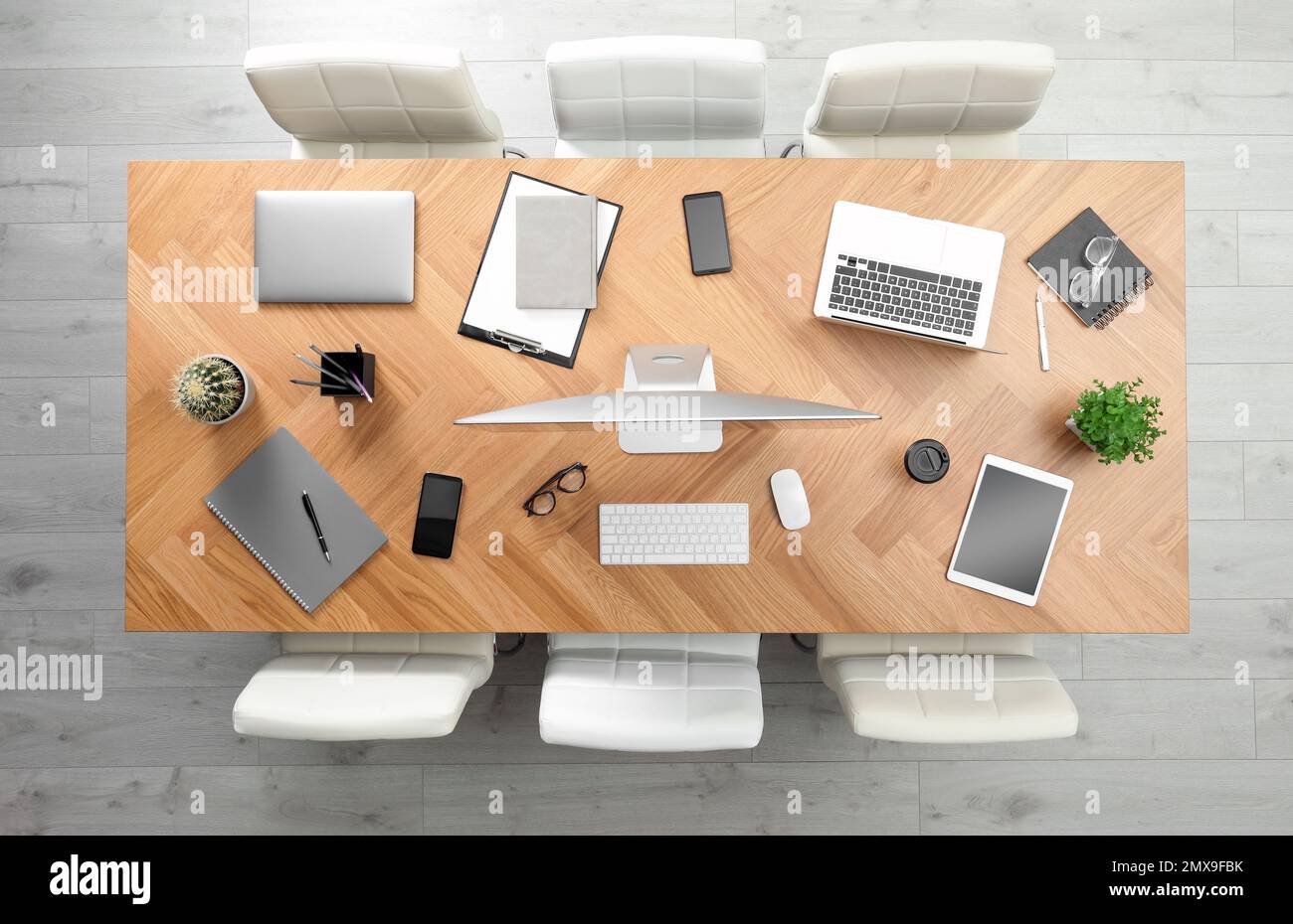 Modern office table with devices and chairs, top view Stock Photo - Alamy