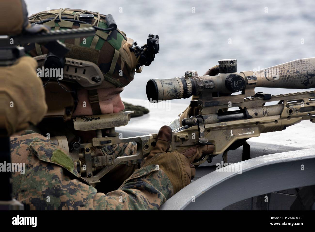 U.S. Marine Corps Cpl. Adam Hytrek, a sniper with Battalion Landing ...