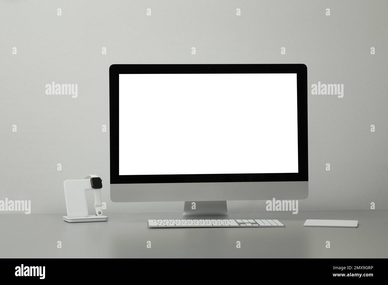 Modern workplace with computer and charging devices. Interior design ...