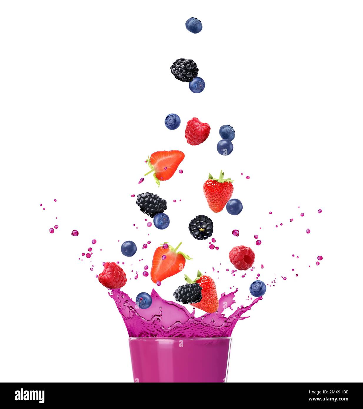 Delicious ripe berries falling in juice with splashes on white ...