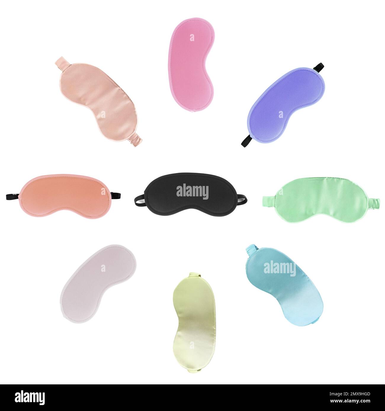 Set of different sleeping eye masks on white background, top view ...