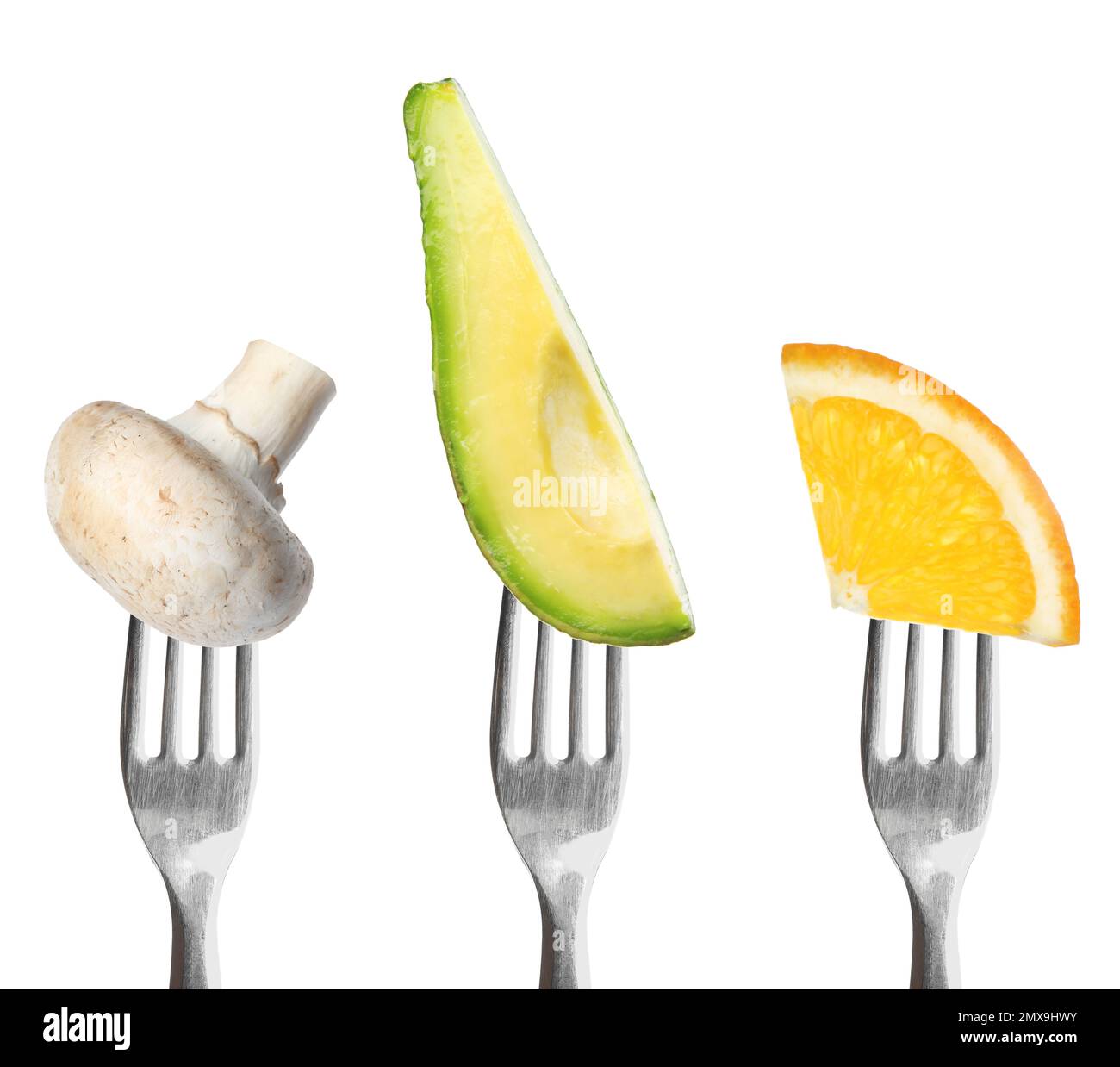 Forks with different vegetables and fruits on white background. Healthy ...