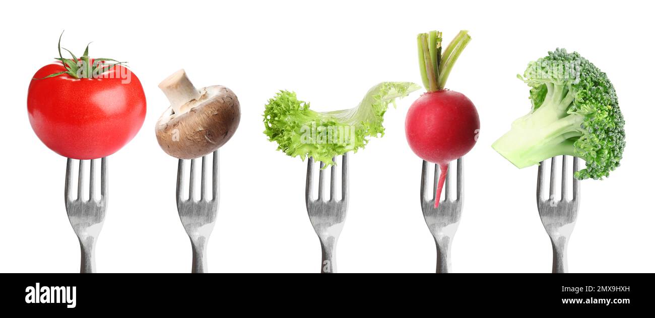 Forks with different vegetables on white background, banner design ...