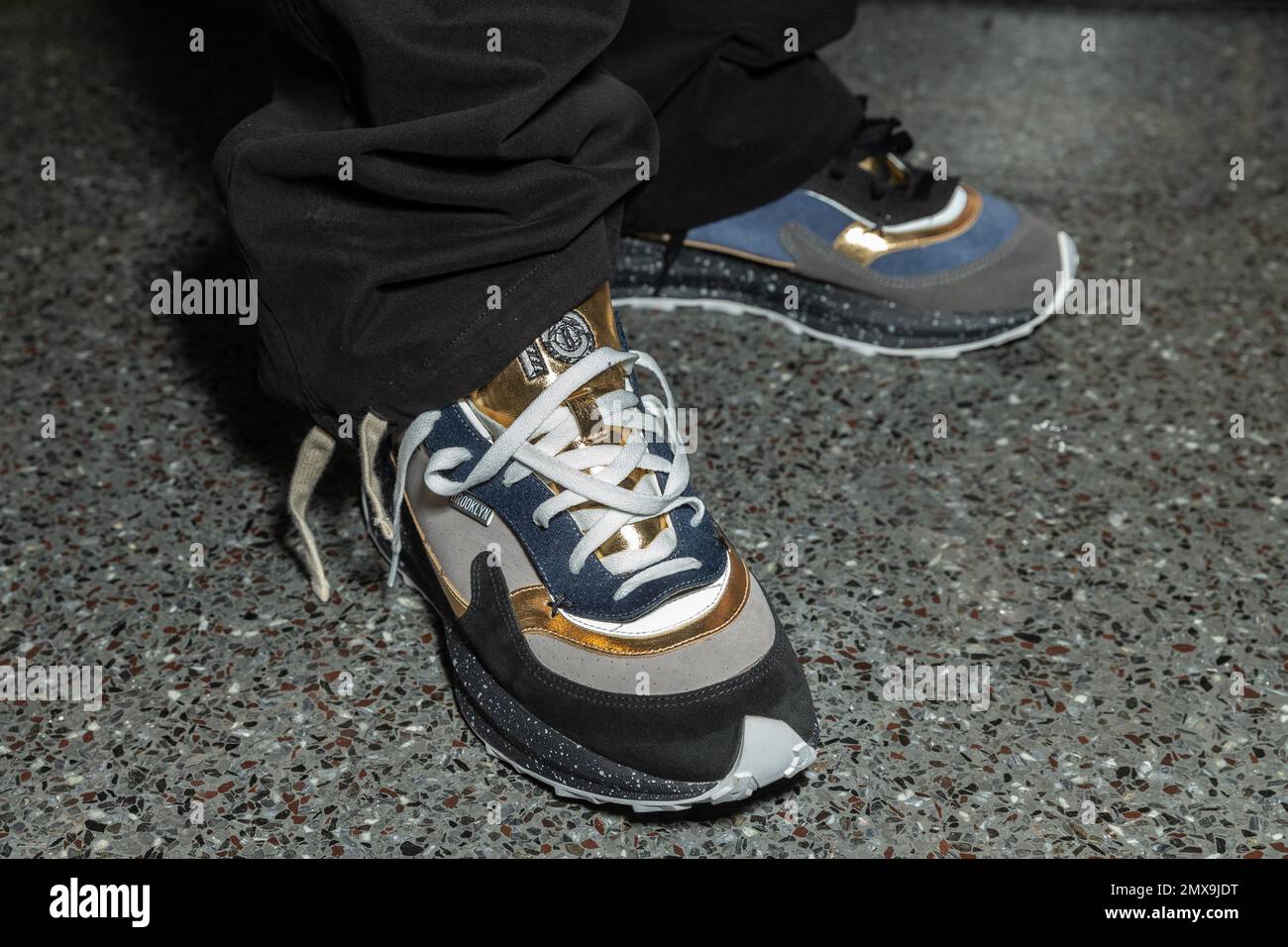 Daniel Gamache wears his newest created sneakers while attending Modelo ...