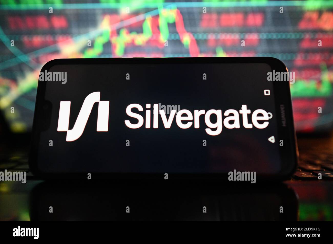 In this photo illustration, a Silvergate logo is displayed on a ...