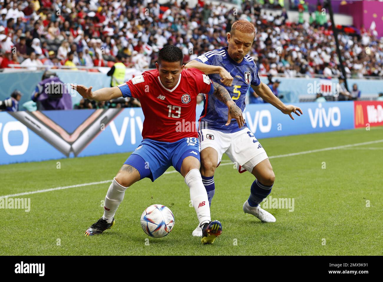 AL-RAYYAN (LR) Gerson Torres of Costa Rica, Yuto Nagatomo of Japan ...