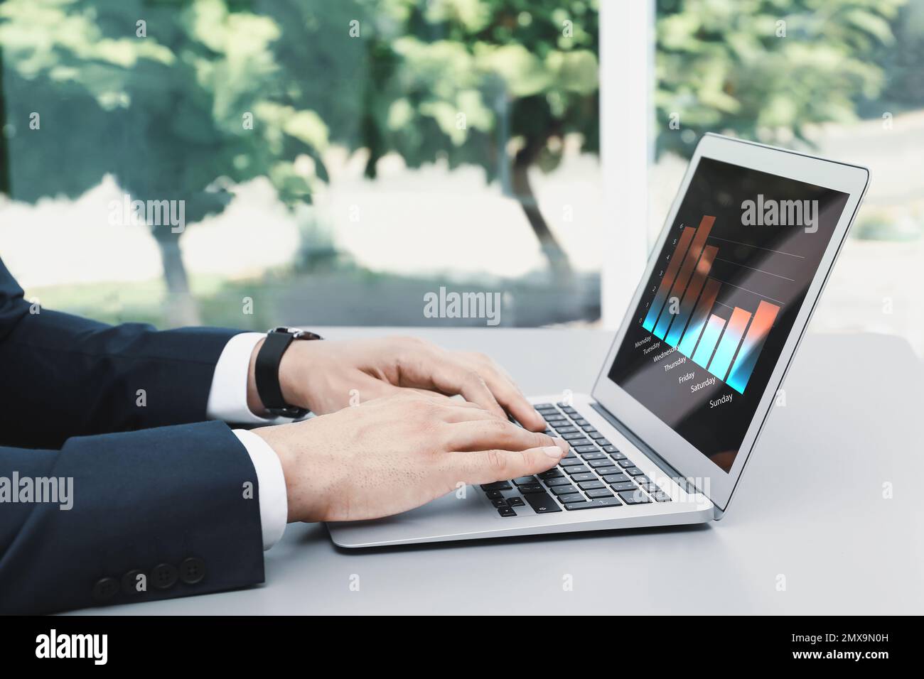 Male broker using computer home hi-res stock photography and images - Alamy