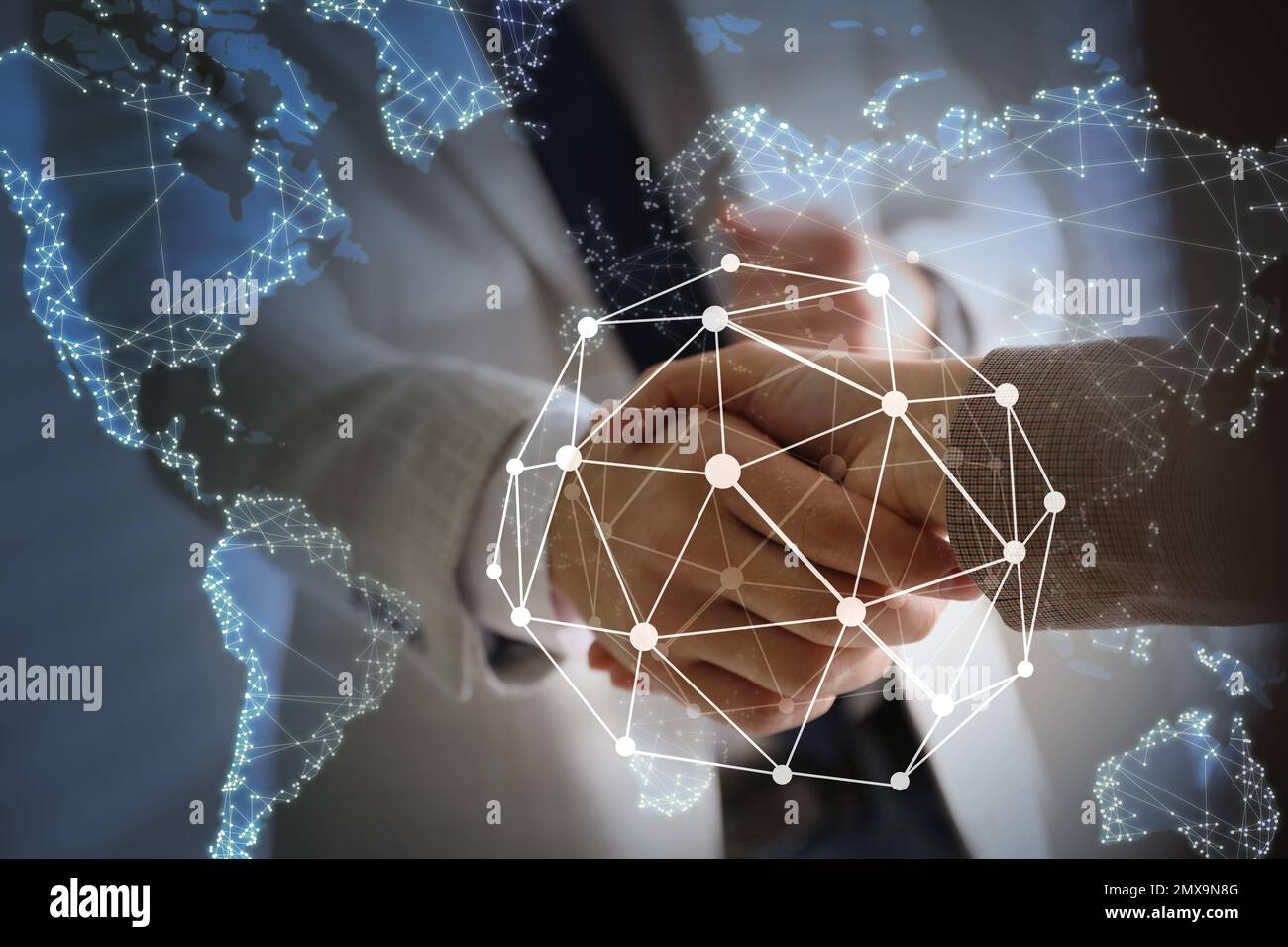 Business people shaking hands and network connection lines, closeup ...